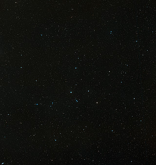 Wide-field image of the Spiderweb Galaxy (ground-based image) | ESA/Hubble