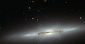 Hubble looks at sideways NGC 4710 (full) | ESA/Hubble