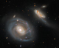 Hubble Captures a Peculiar Galactic Pair | ESA/Hubble